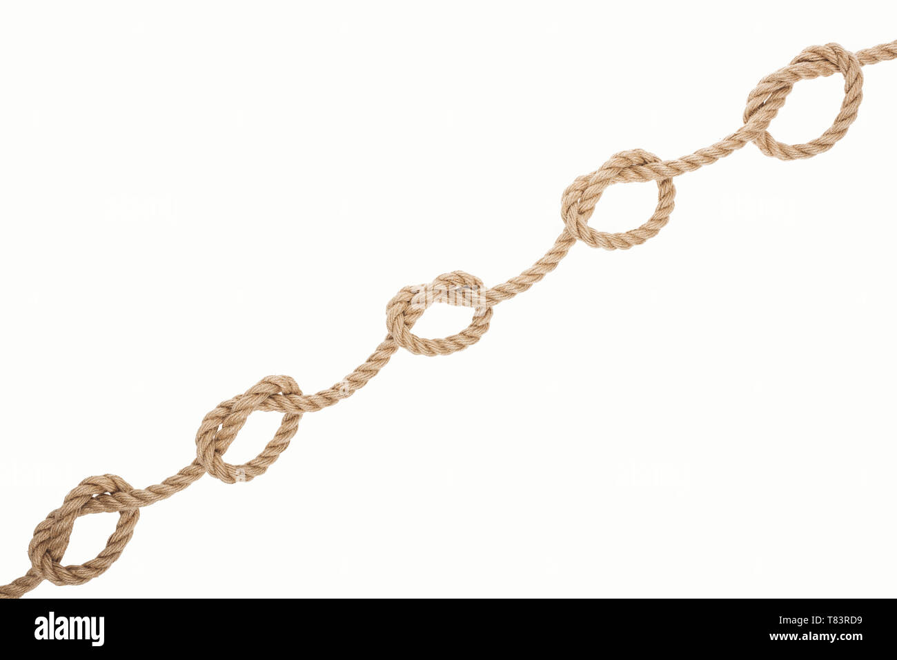 nautical brown rope with sailor knots isolated on white Stock Photo - Alamy
