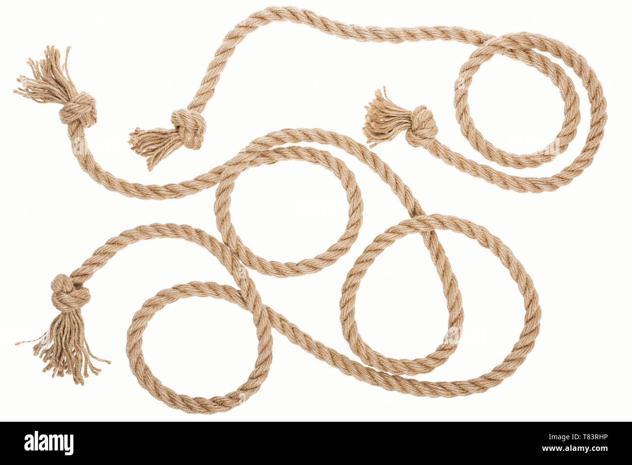 brown jute ropes with curls and knots isolated on white Stock Photo - Alamy
