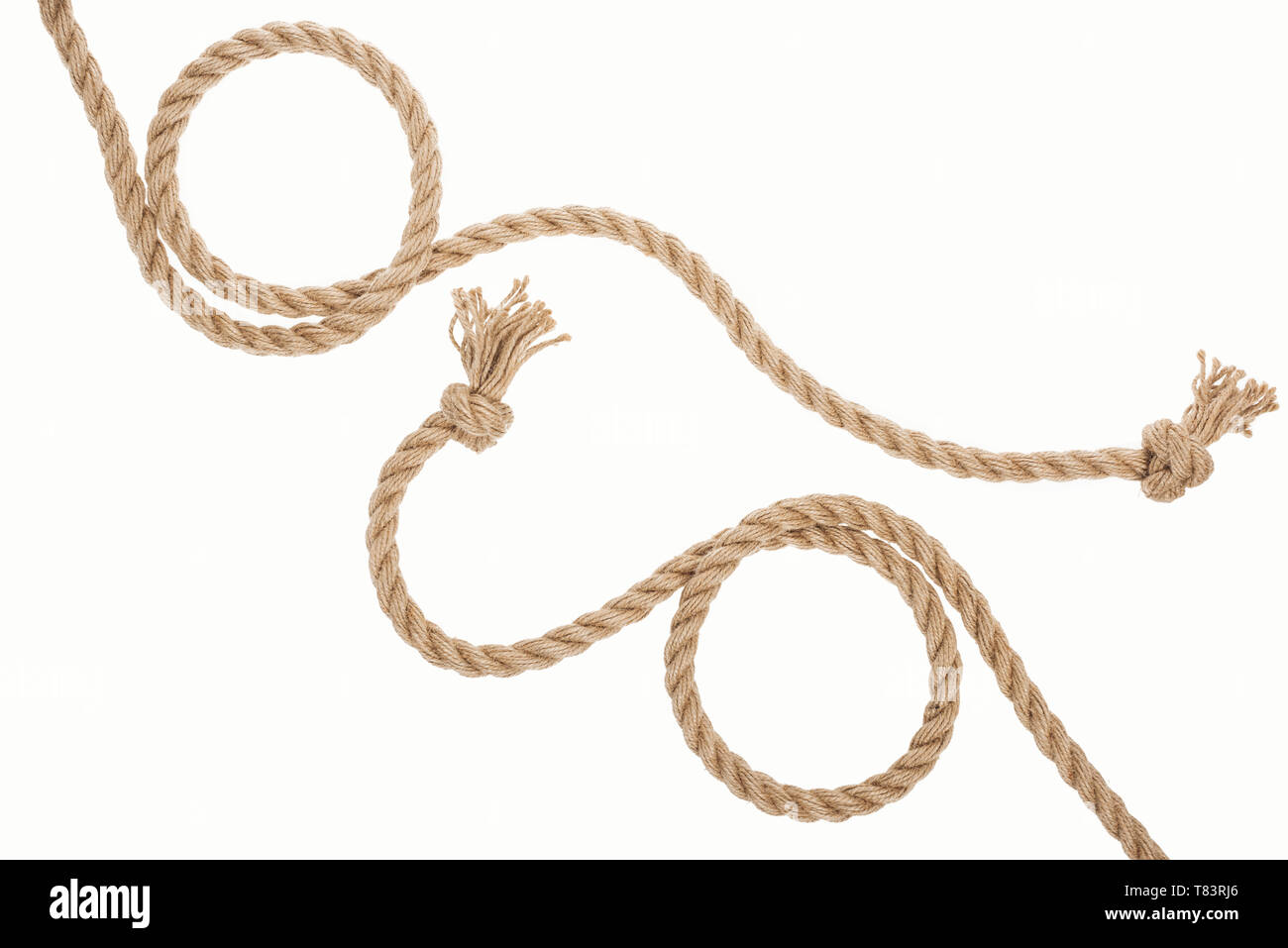 brown curled ropes with knots isolated on white Stock Photo - Alamy