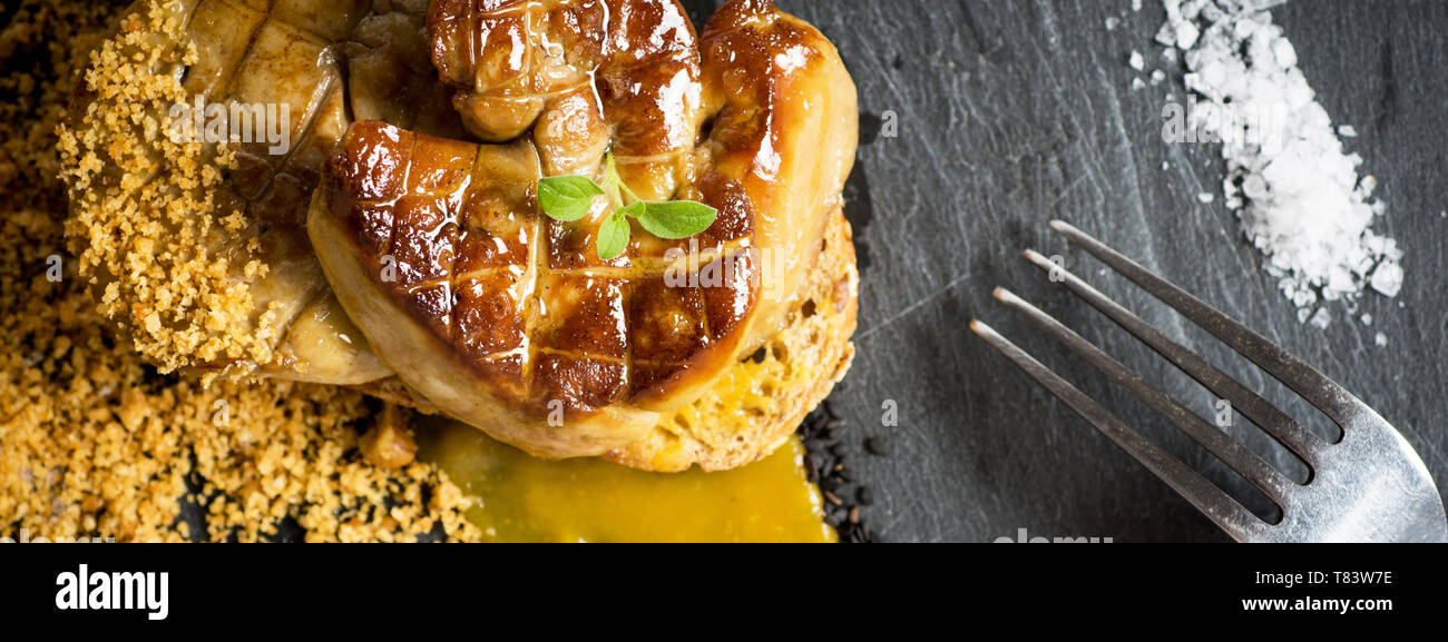 Fried Goose Liver .Foie Gras with Mango Puree Stock Photo - Alamy