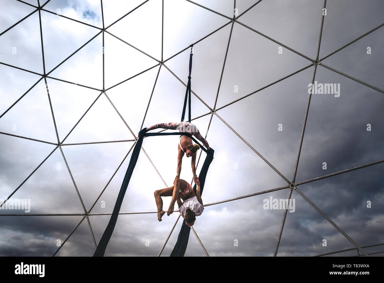 Couple team peole of acrobatice air dance traing together for perfect ...
