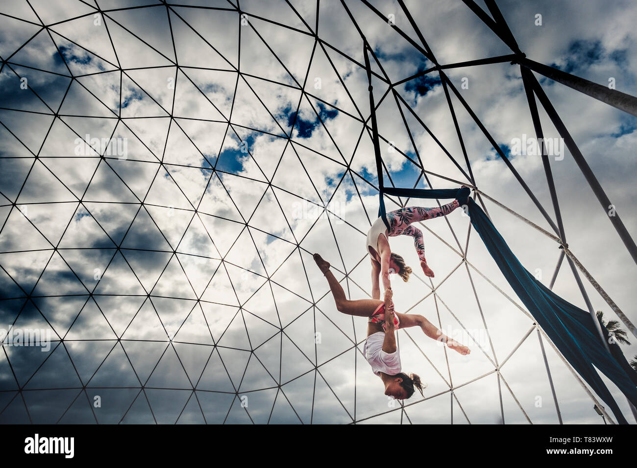 Beautiful fit body people young girls doing acrobat circus style ...