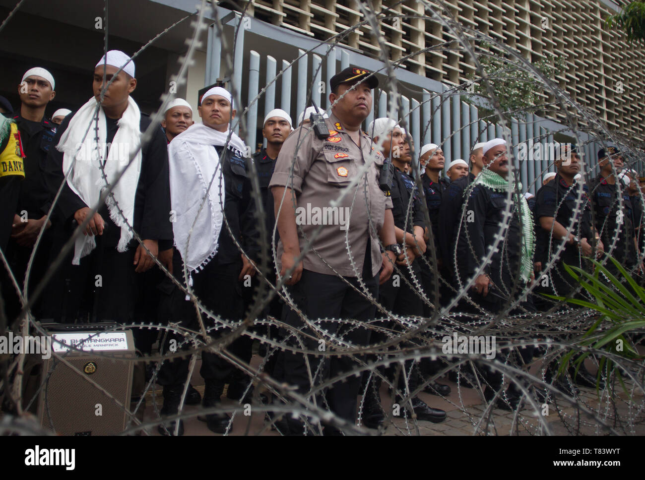 Police installed barbed wire seen during the demonstration. Supporters ...