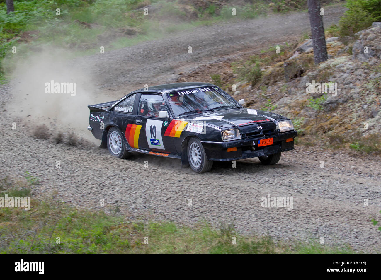 Fast rally car on a dusty dirt road in sweden Stock Photo - Alamy