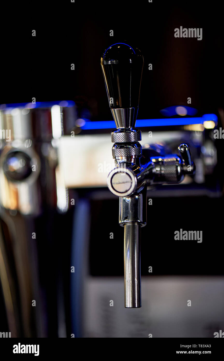 Tap in the bar for pouring drinks and beer.Closely. Luster of metal ...
