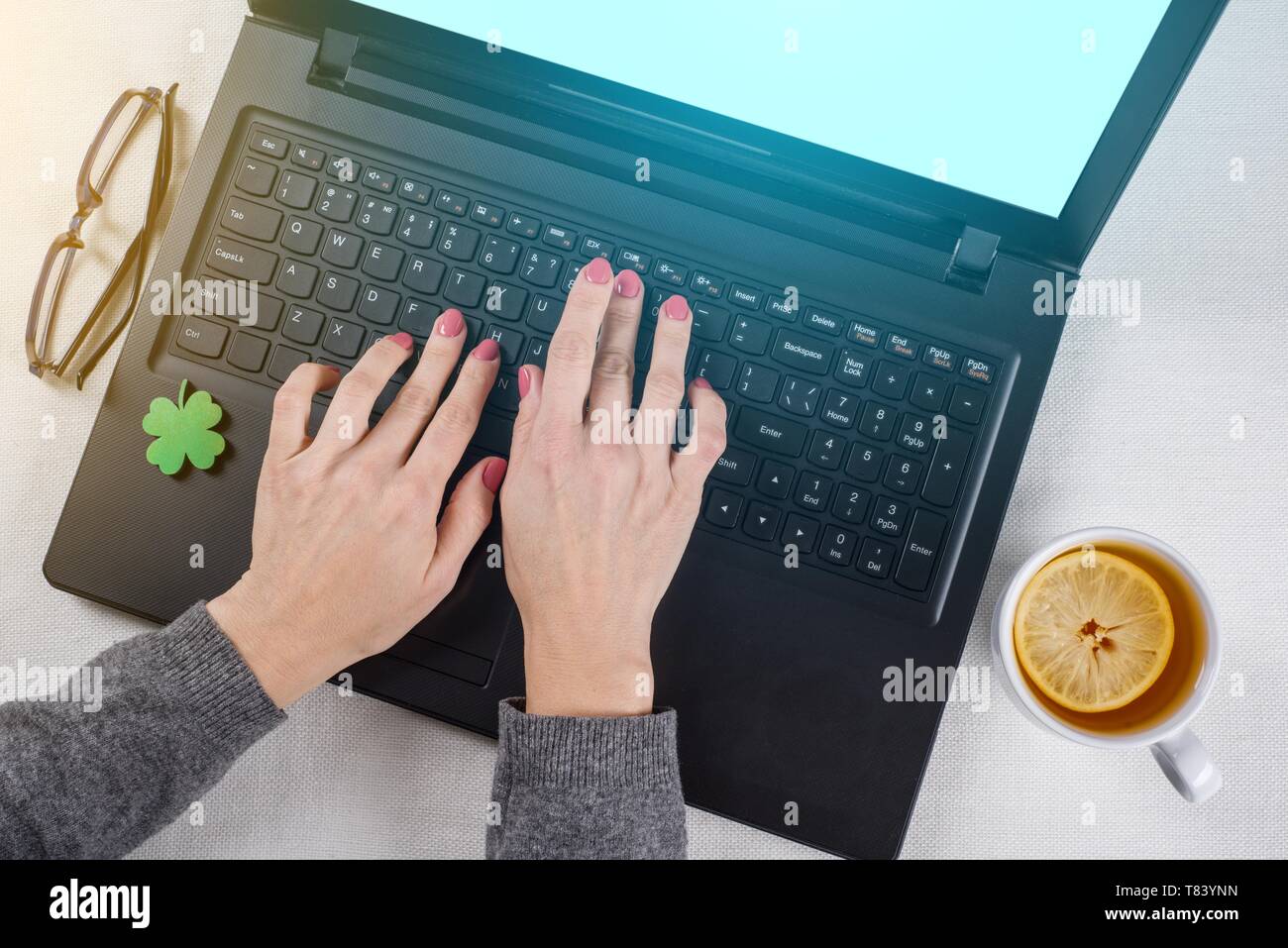 Abstract green leaf clover on computer keyboard Stock Photo - Alamy