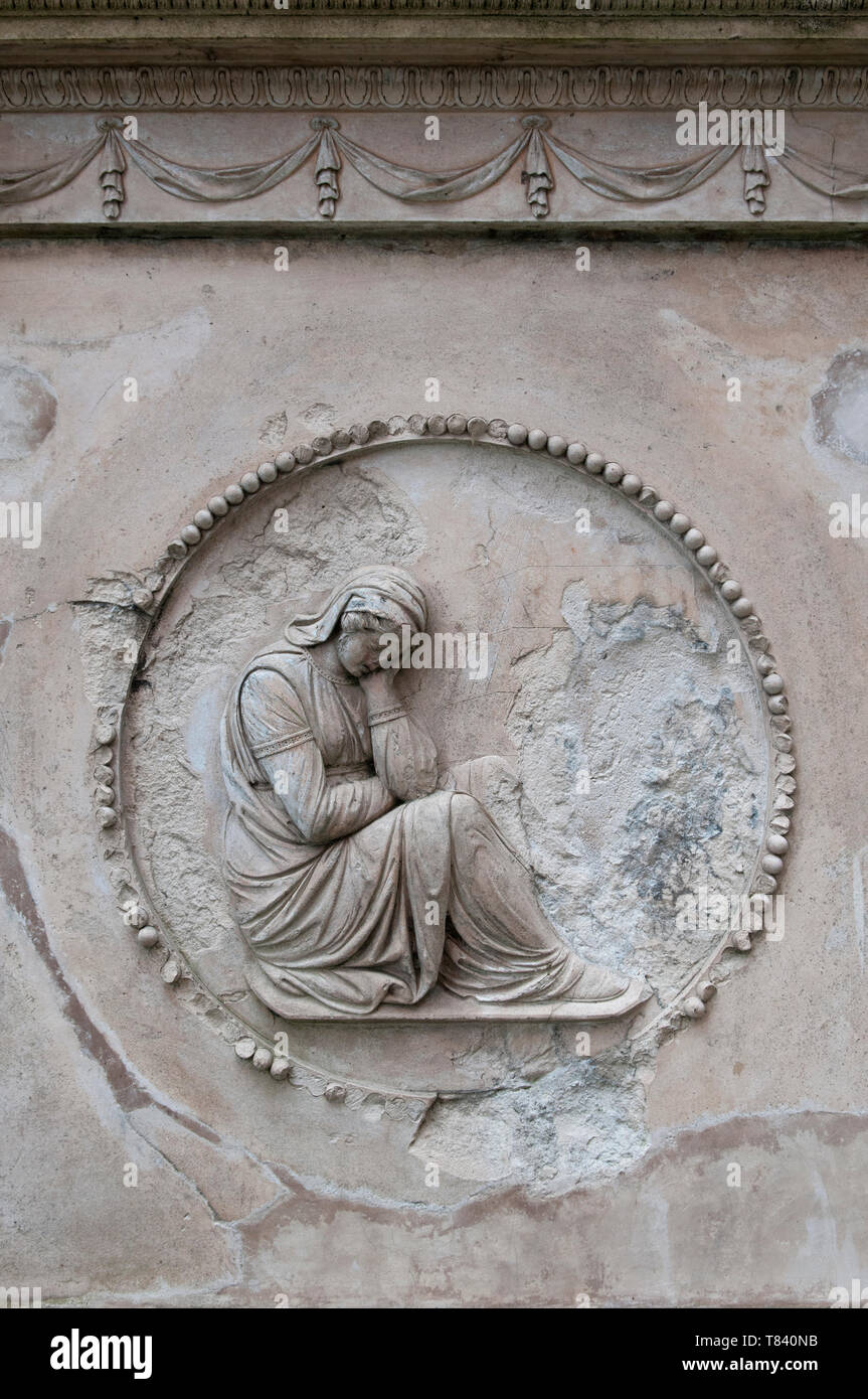 A Close Up Of A Grieving Lady As Exterior Decoration On An Old Tomb ...