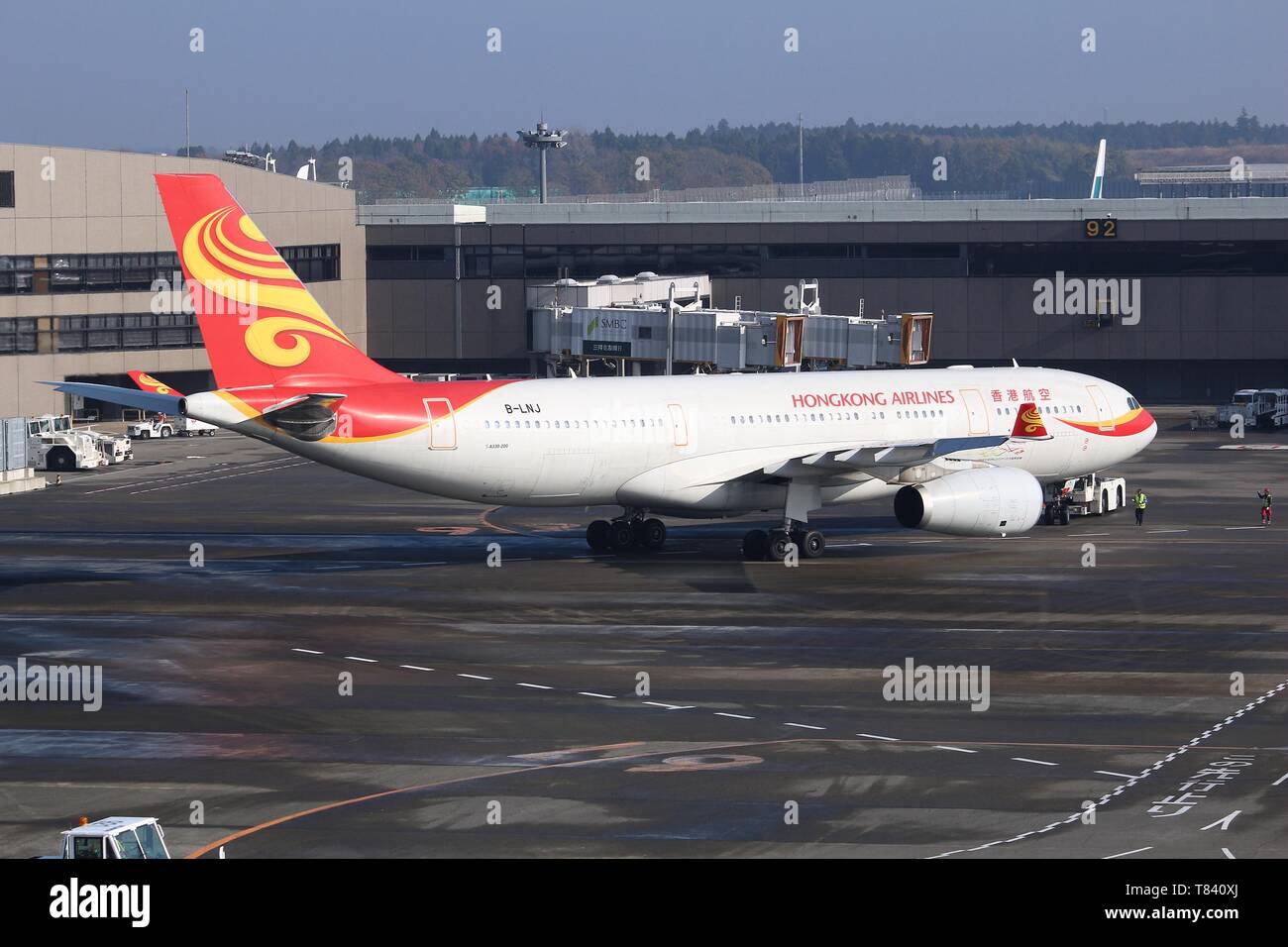 TOKYO, JAPAN - DECEMBER 5, 2016: Hongkong Airlines Airbus A330 taxies ...