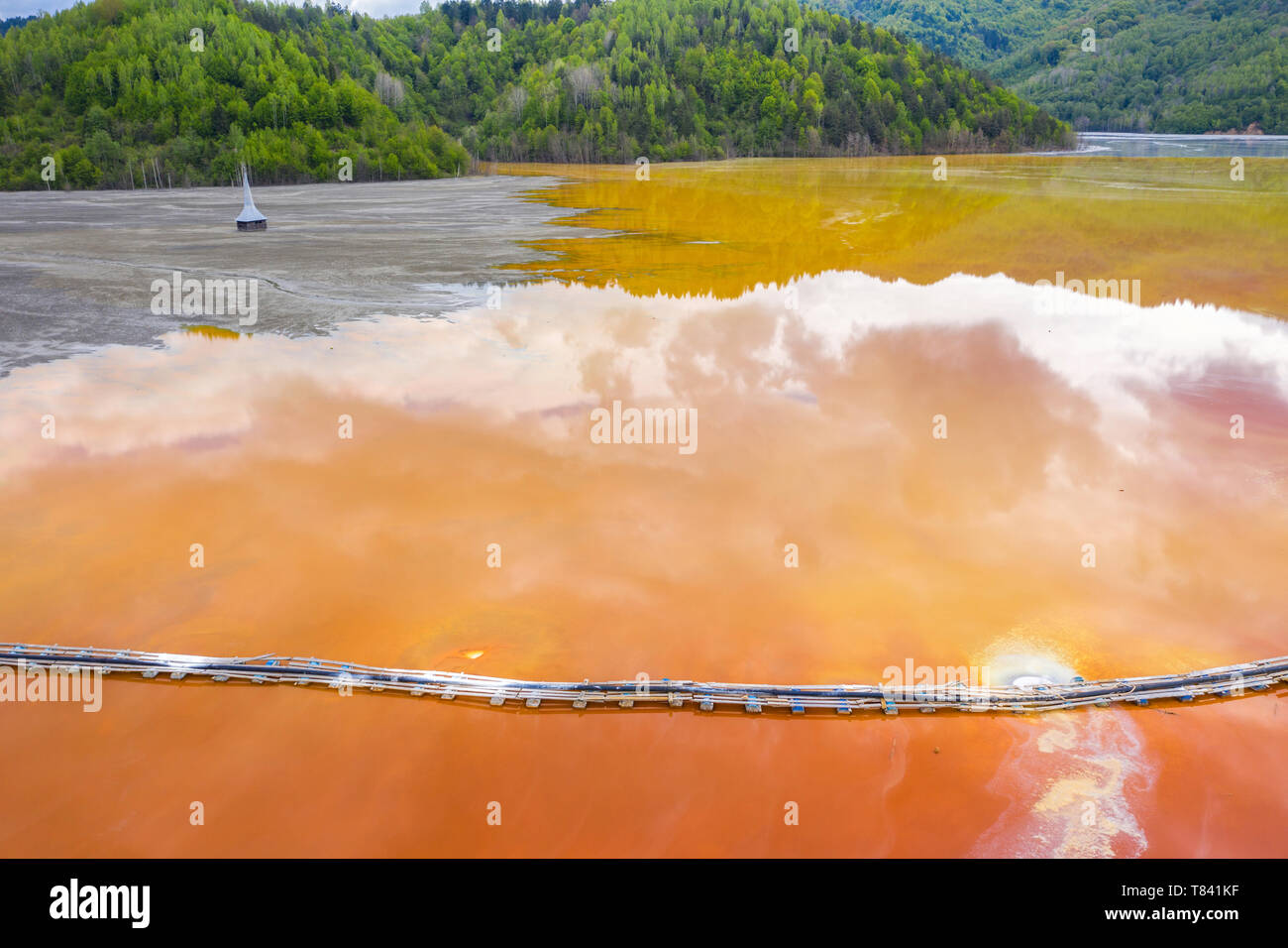 Aerial view of mining settling basin and lime supply. Colorful red ...