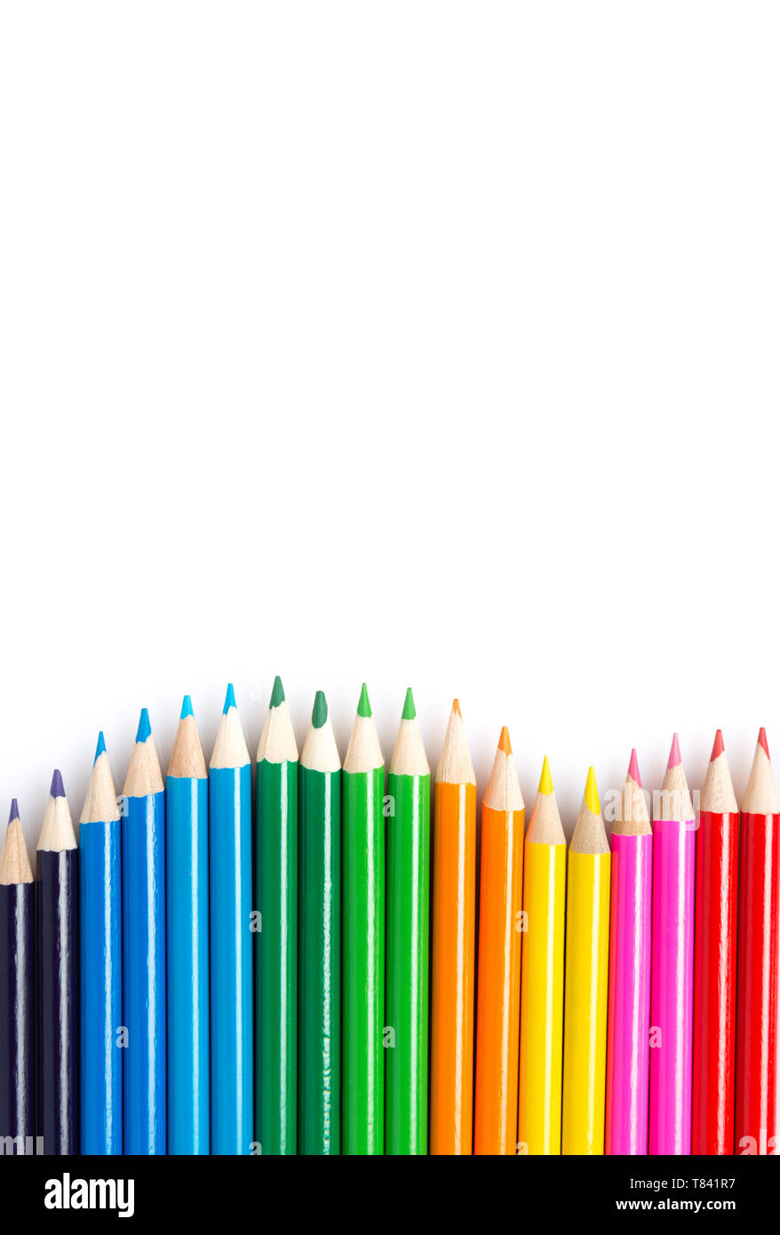 colourful still life with pencils and art supplies on white background ...