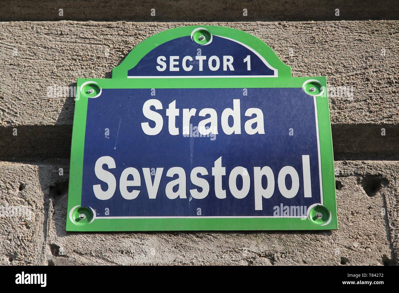 Bucharest, capital city of Romania. Typical street sign at Sevastopol ...