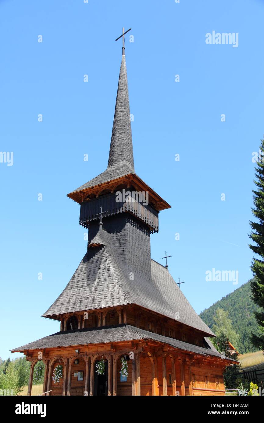 Wooden church in Romania - town of Poiana Brasov Stock Photo - Alamy