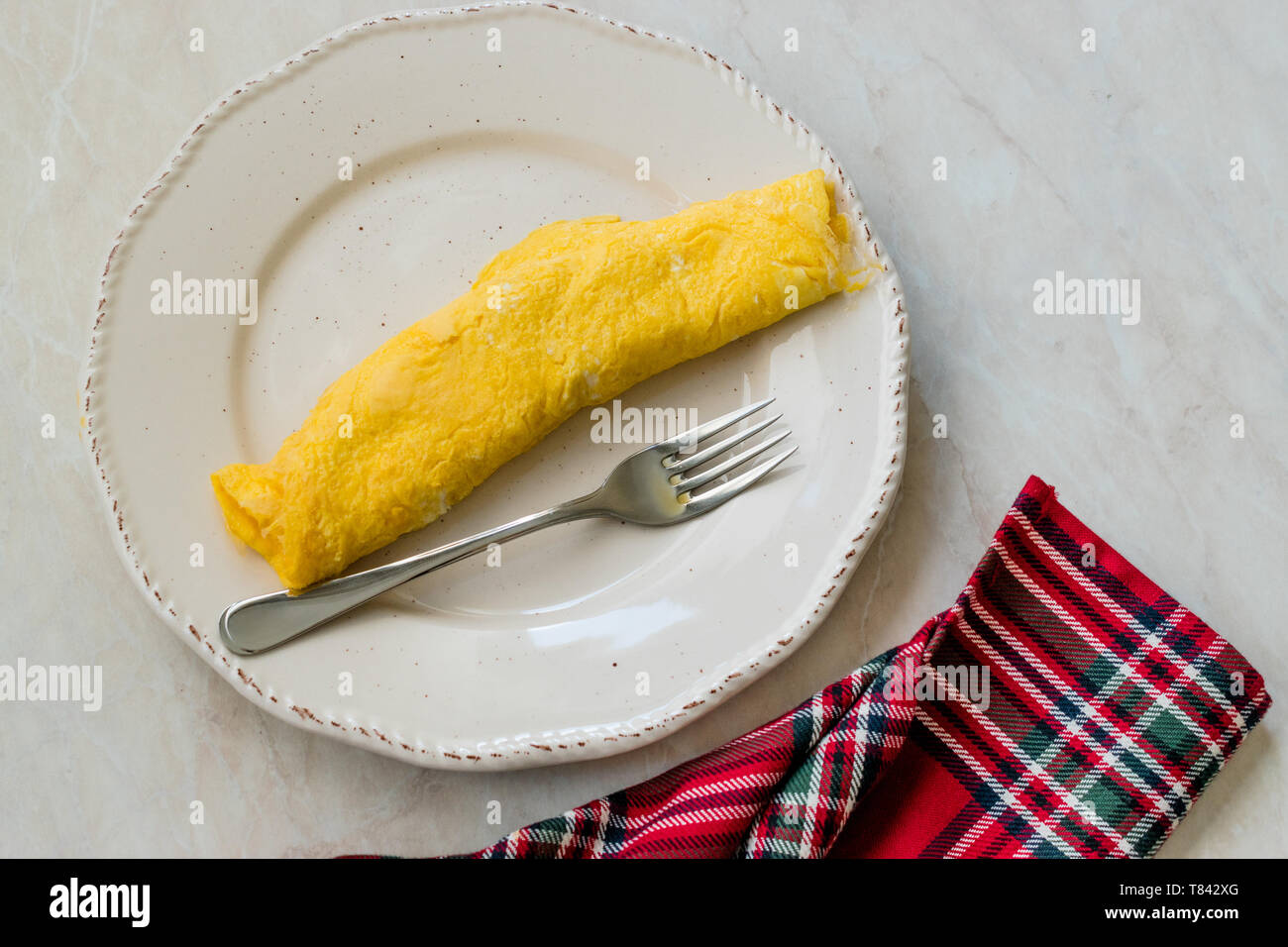 French Omelette served with Plate for Breakfast. Traditional Food Stock ...
