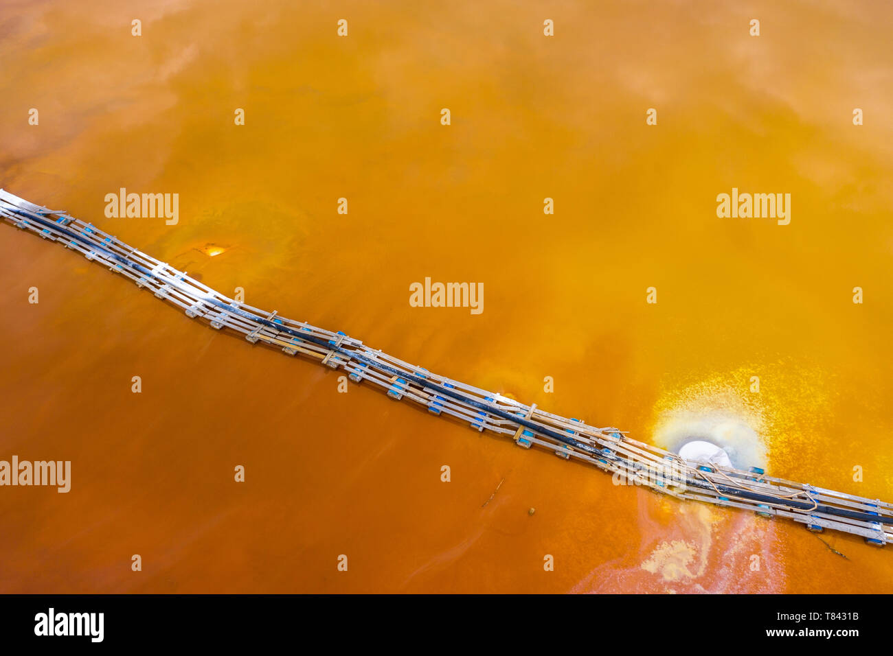 Aerial view of acid mine drainage, colorful red copper mine water ...