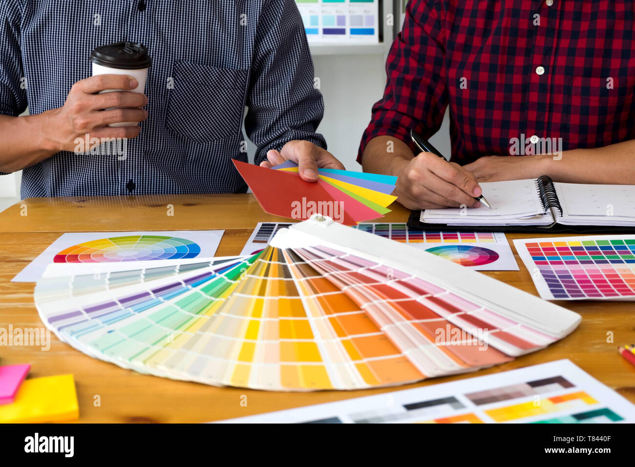Graphic designers choose colors from the color bands samples for design ...