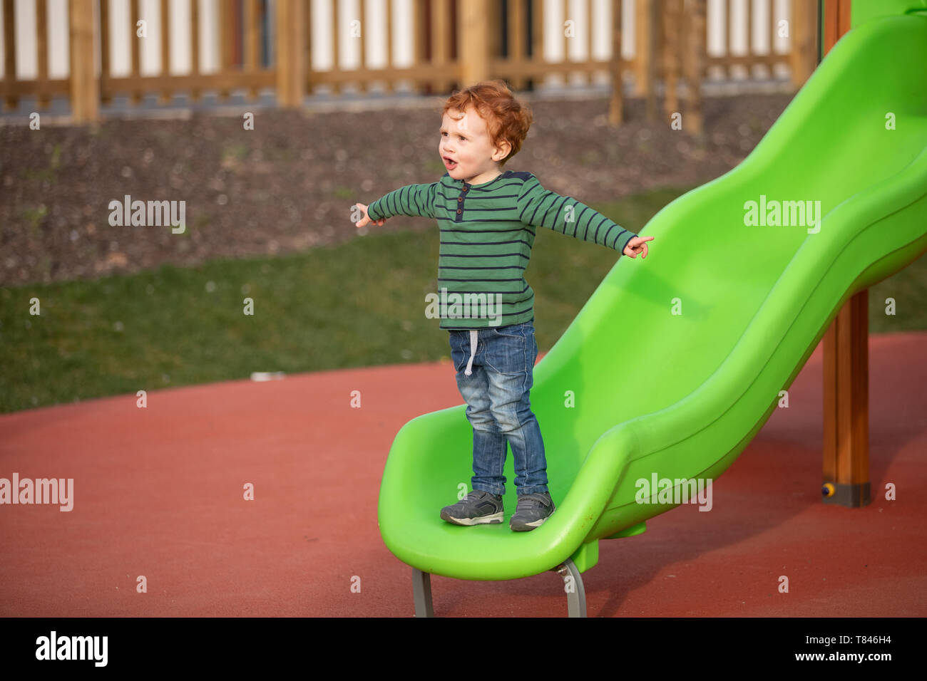 Boy slide hair hi-res stock photography and images - Alamy