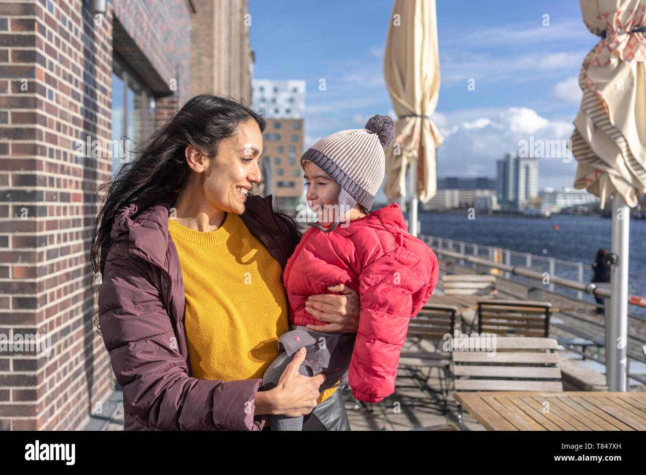 Mother and daughter by river, Berlin, Germany Stock Photo - Alamy