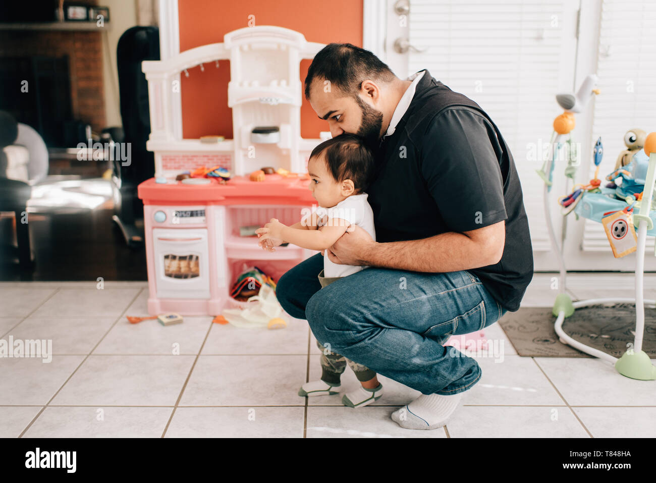 Indian father and son in kitchen hi-res stock photography and images ...