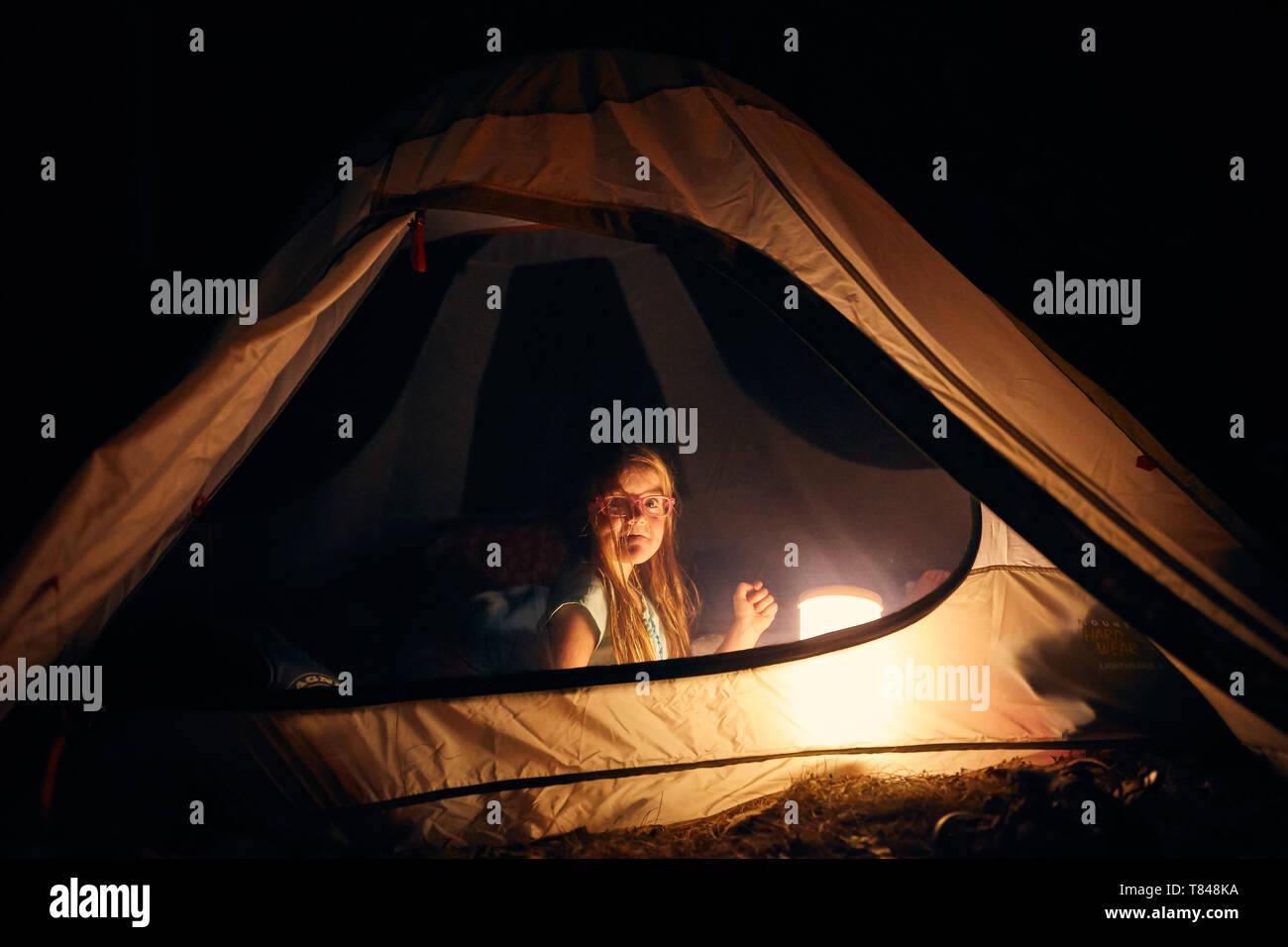 Girl inside tent night hi-res stock photography and images - Alamy