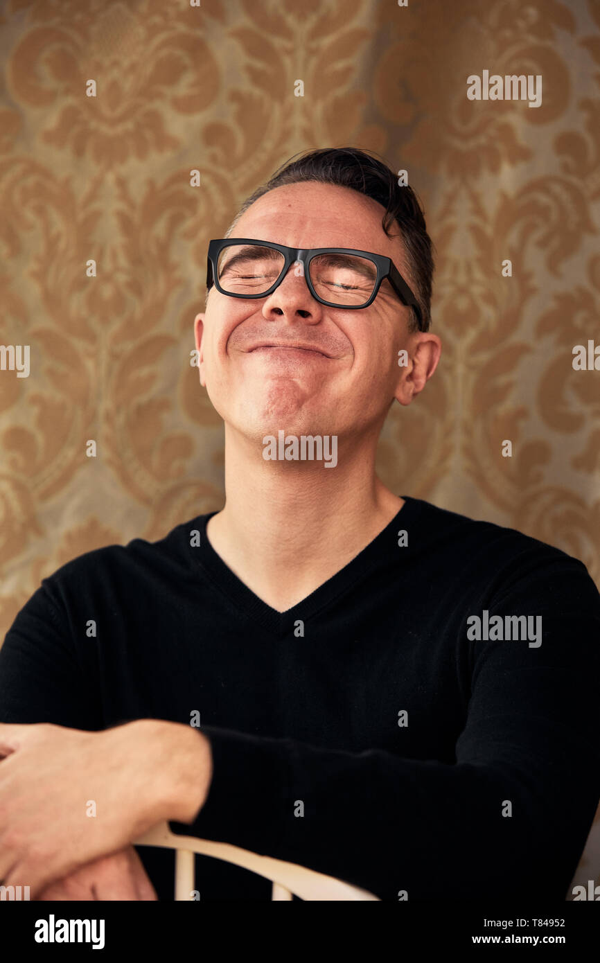 Comedian making funny face Stock Photo - Alamy