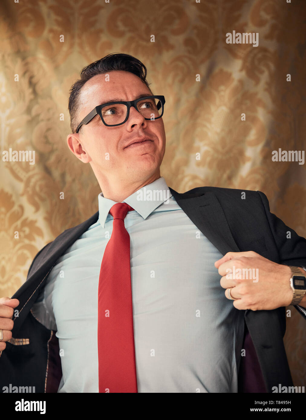Comedian in superhero gesture Stock Photo - Alamy
