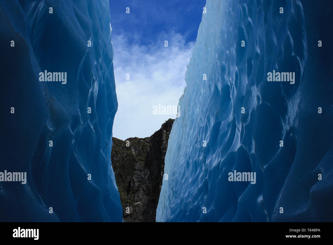 Crystal blue ice on the Franz Josef Glacier, West coast, New Zealand ...