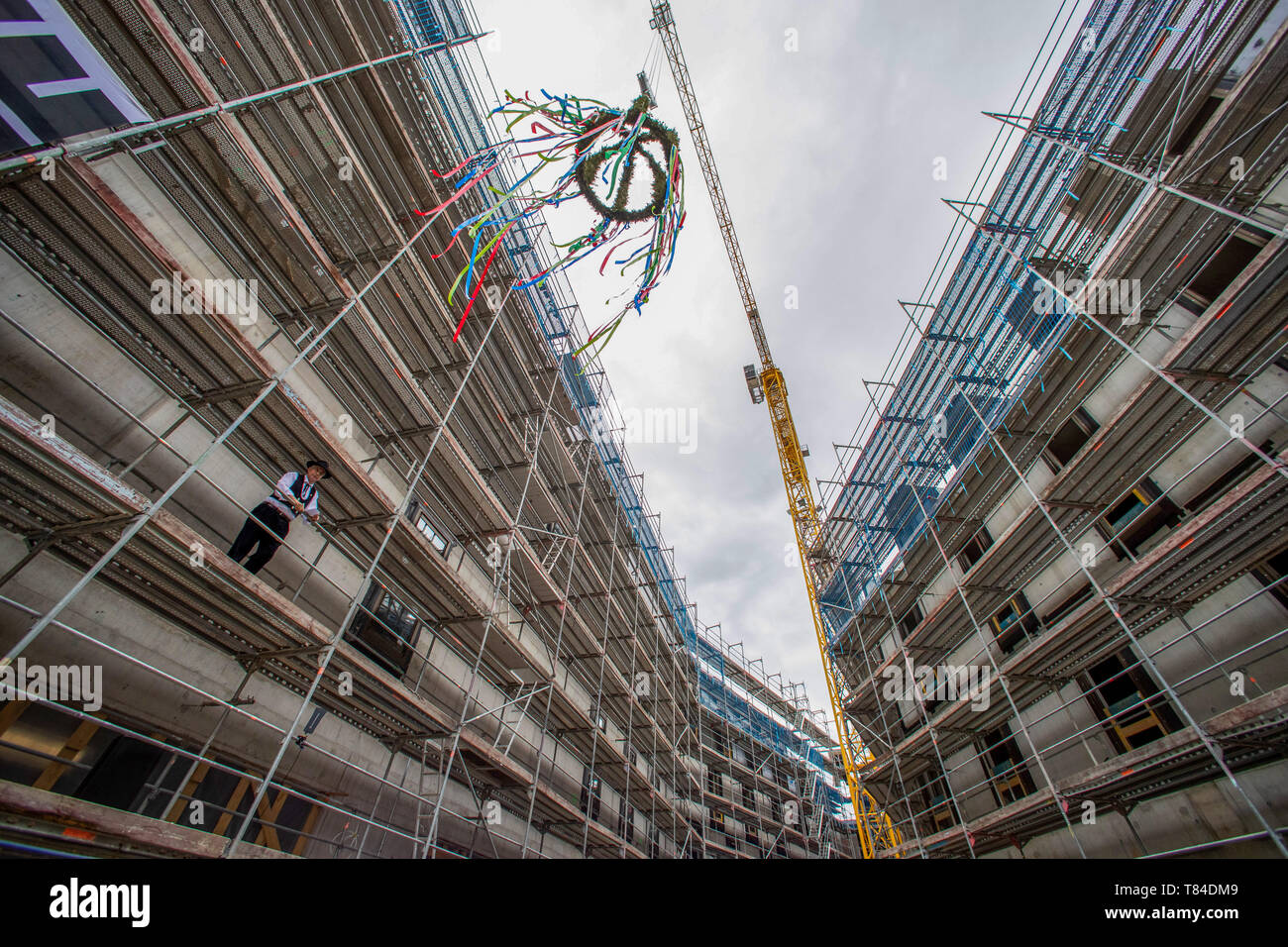Nuremberg, Germany. 10th May, 2019. A topping-out crown hangs on a ...