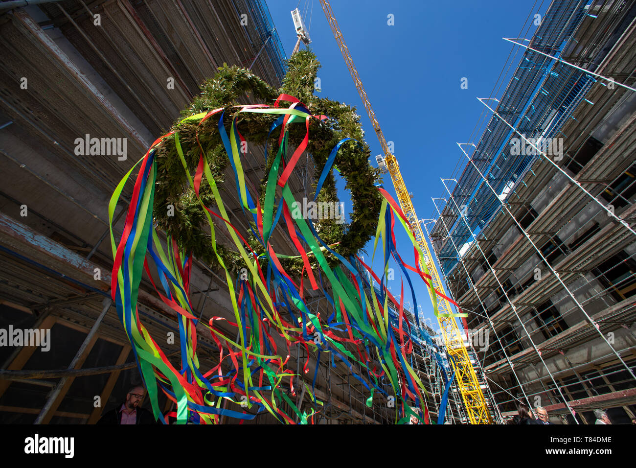 Nuremberg, Germany. 10th May, 2019. A topping-out crown hangs on a ...
