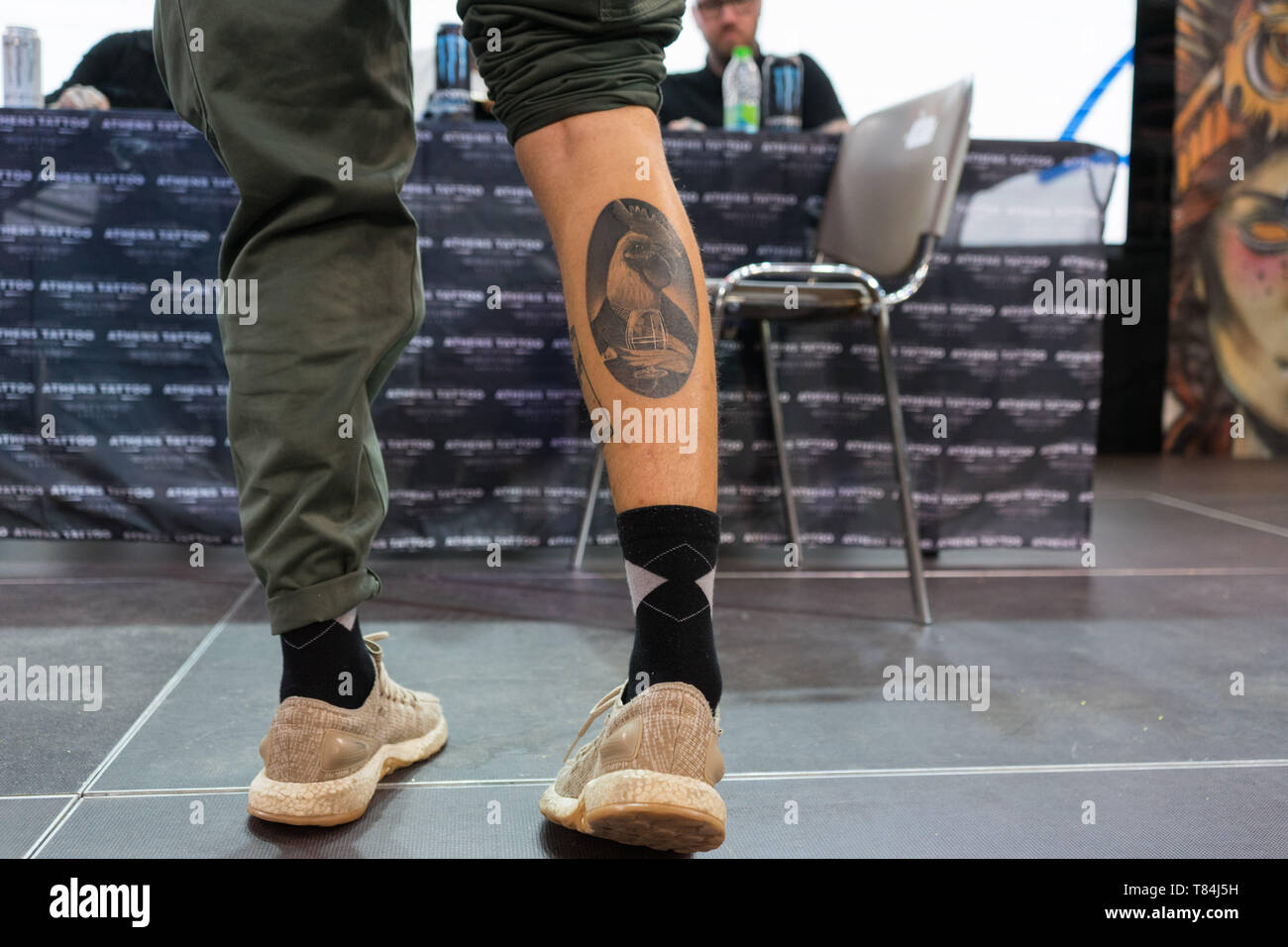 Athens, Attica, Greece. 10th June, 2019. A leg seen with a tattoo ...