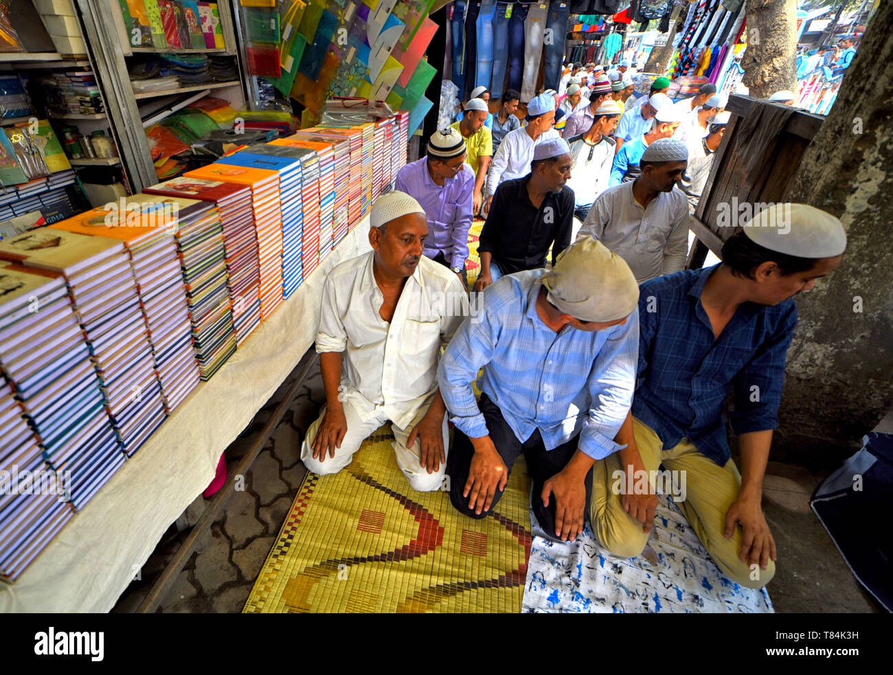 Muslims pray in street hi-res stock photography and images - Alamy