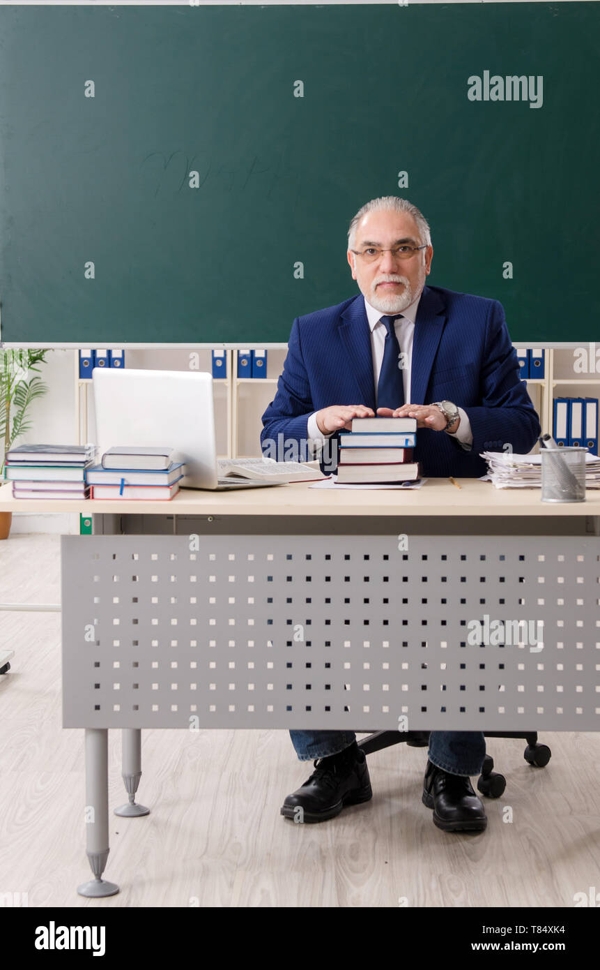 Male teacher presenting school test hi-res stock photography and images ...
