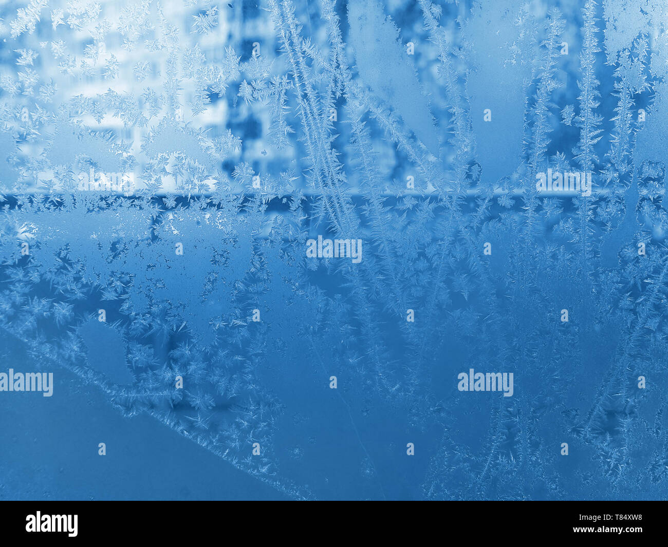Natural ice pattern on winter glass Stock Photo - Alamy