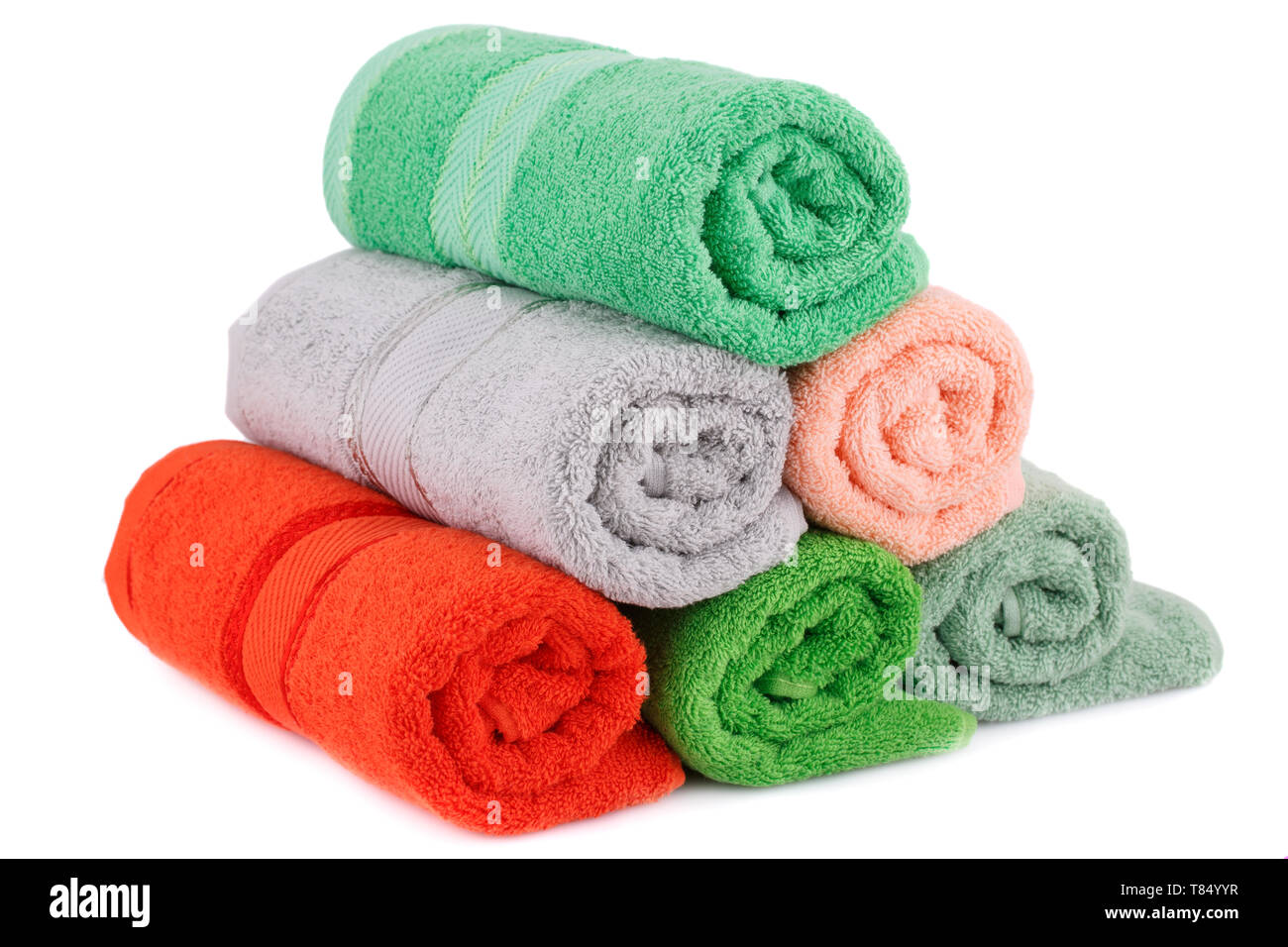 Rolled towels isolated on white background Stock Photo - Alamy