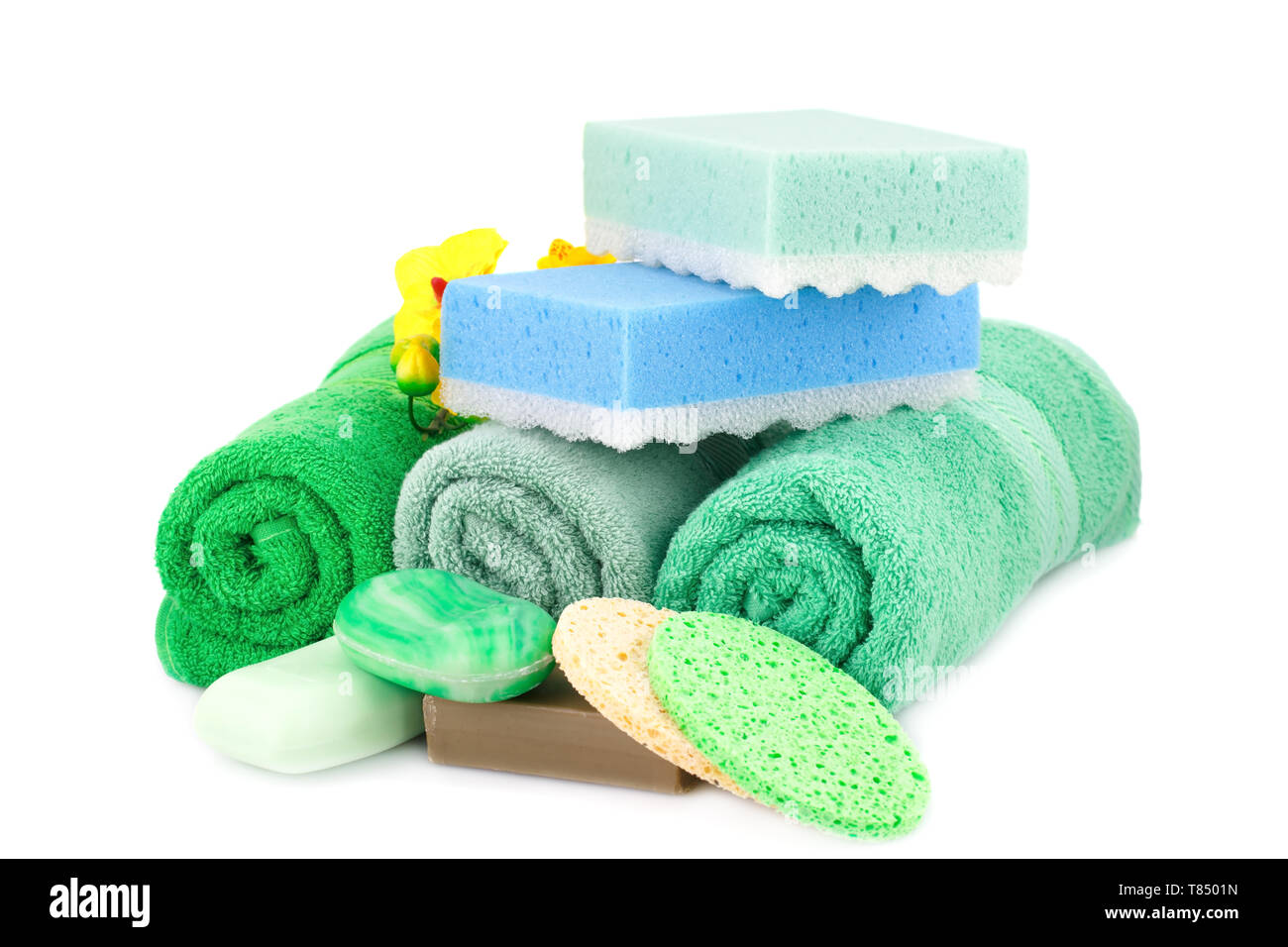 Spa set with towels, soaps, sponges and orchid flowers isolated on ...