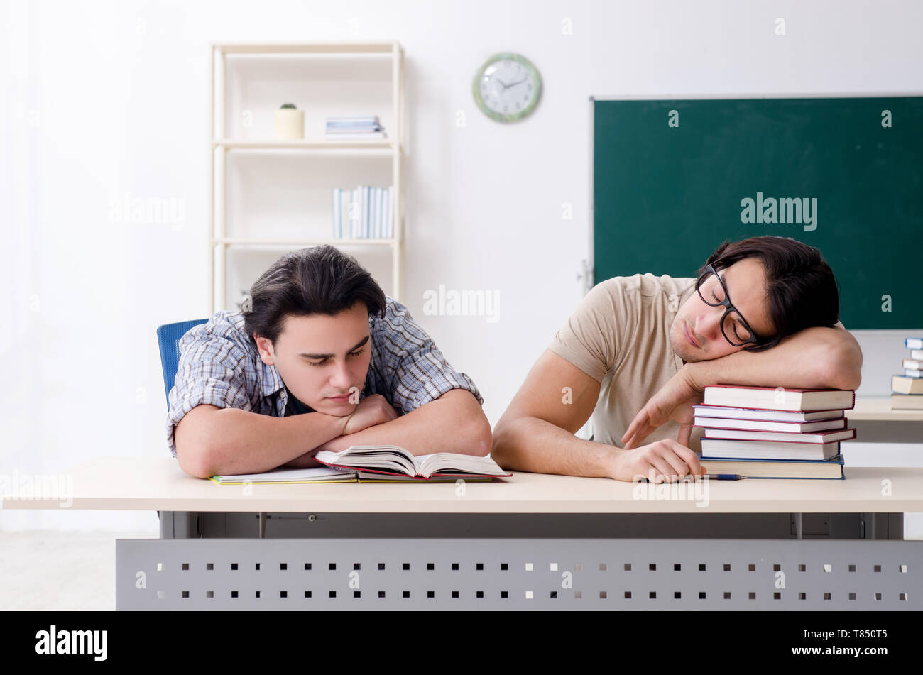 Two male students in the classroom Stock Photo - Alamy