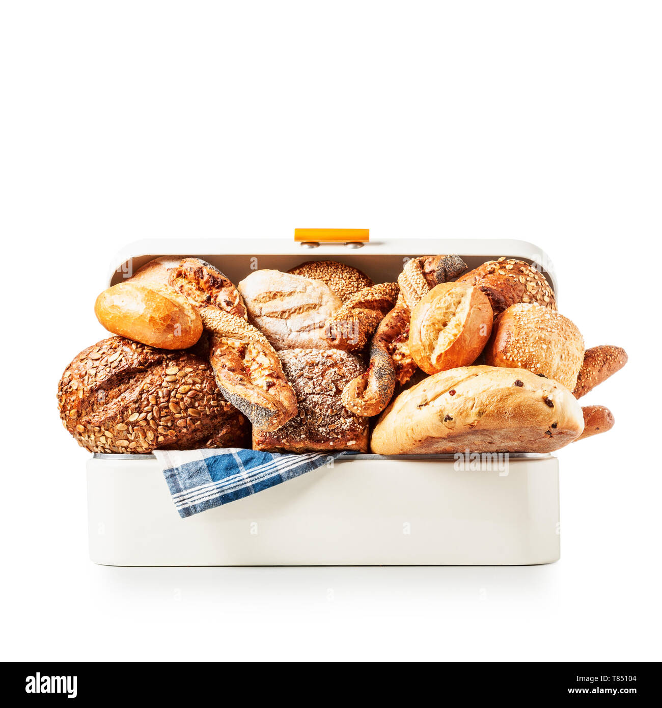 Vintage bread box with various bread, rolls and buns isolated on white ...