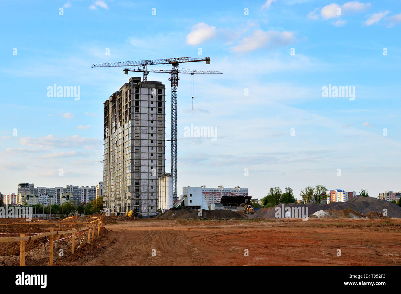 Tower cranes at construction site, construction of high-rise building ...
