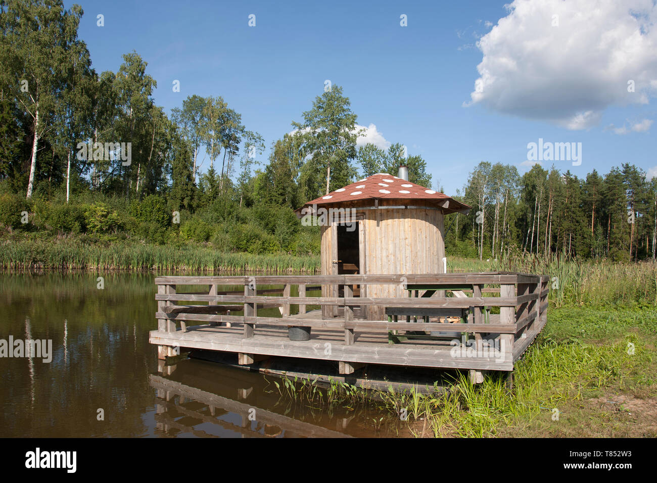 Small Hut Overlooking a Pond Stock Photo - Alamy