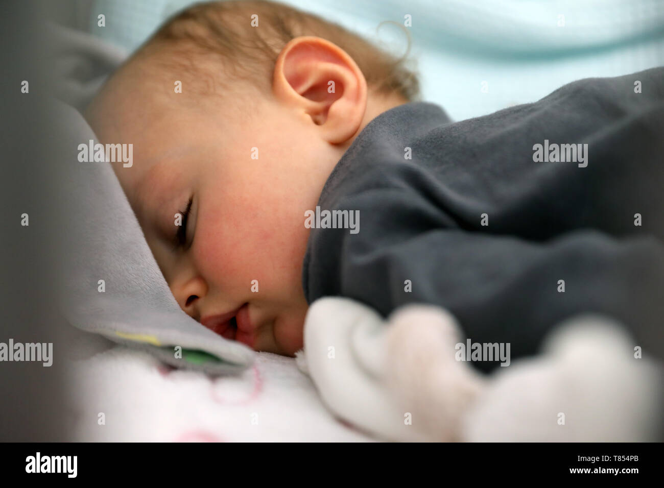 Baby boy face hi-res stock photography and images - Alamy