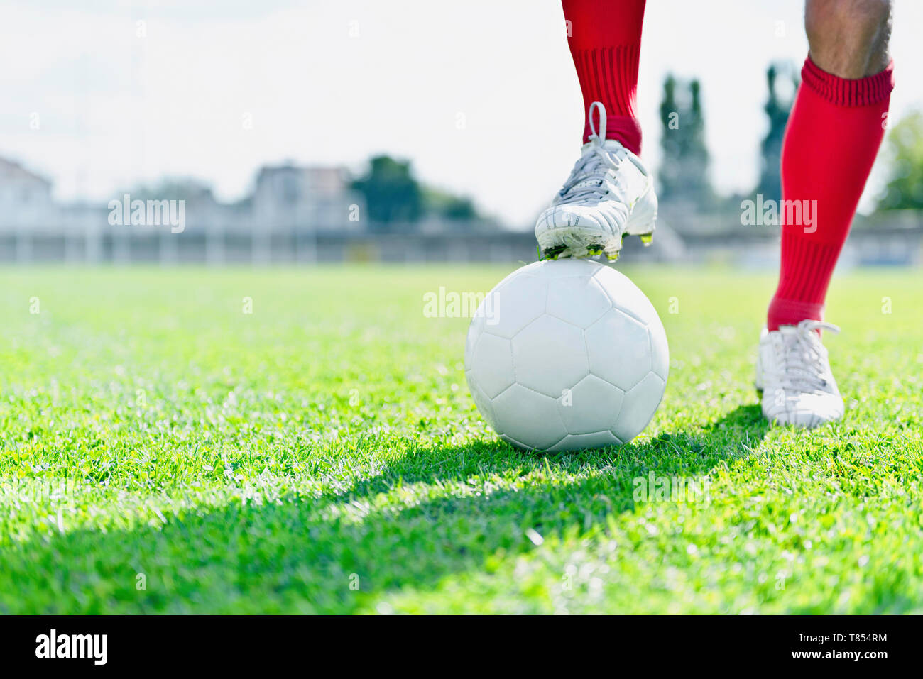 Soccer player legs standing ball hi-res stock photography and images ...