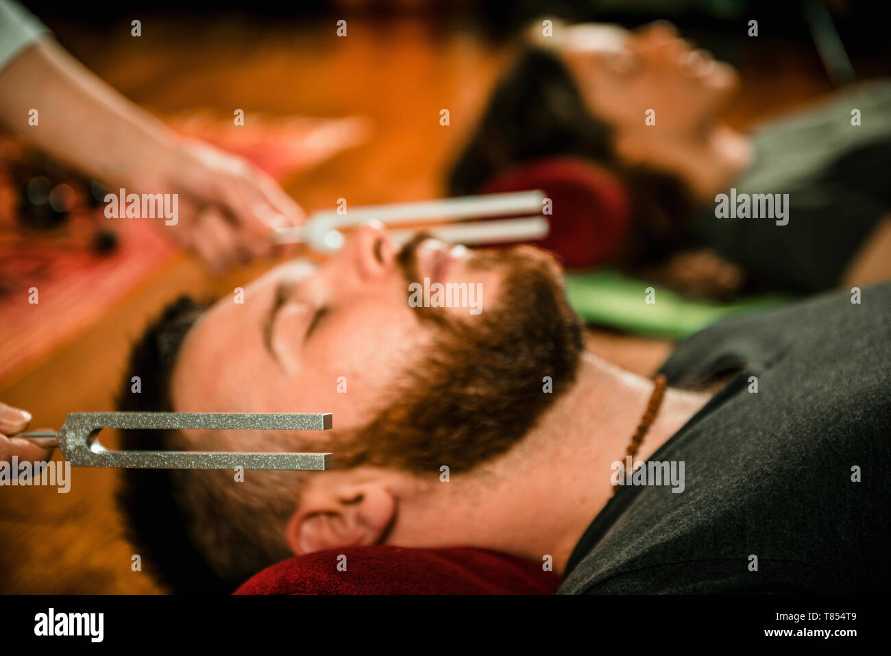 Tuning fork sound therapy Stock Photo - Alamy