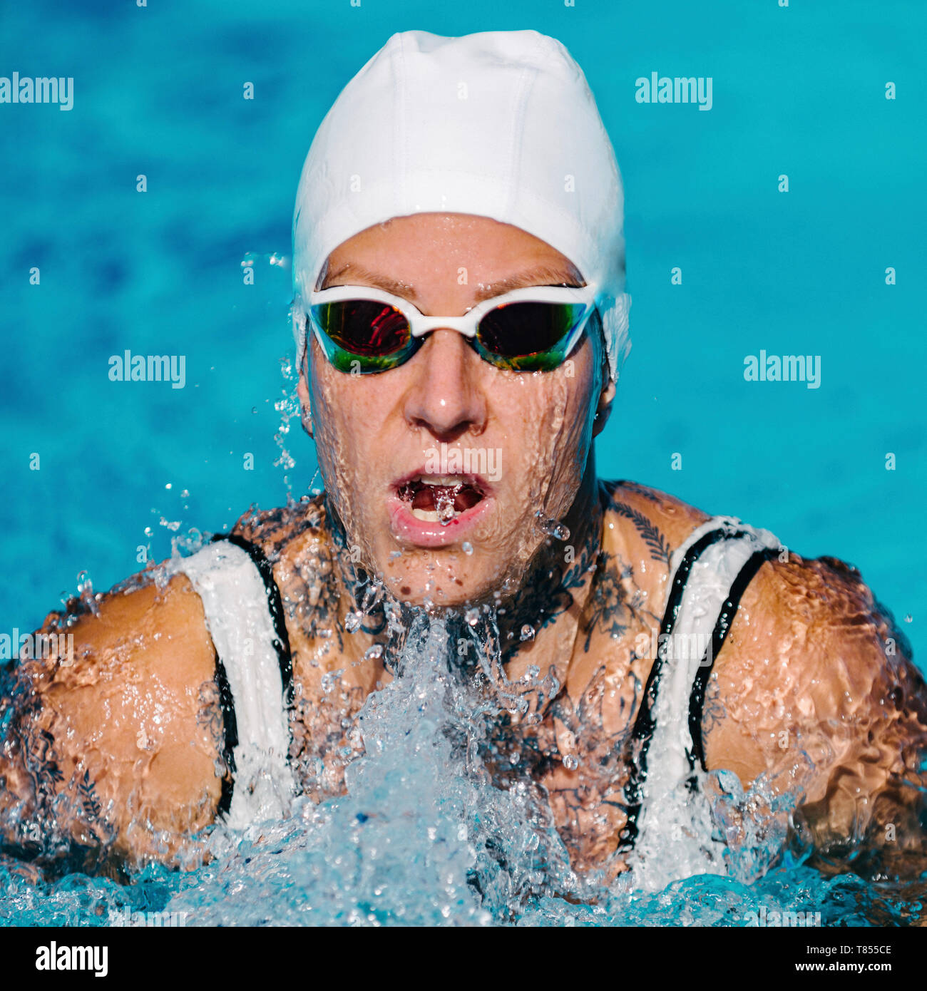 Woman swimming breaststroke Stock Photo - Alamy
