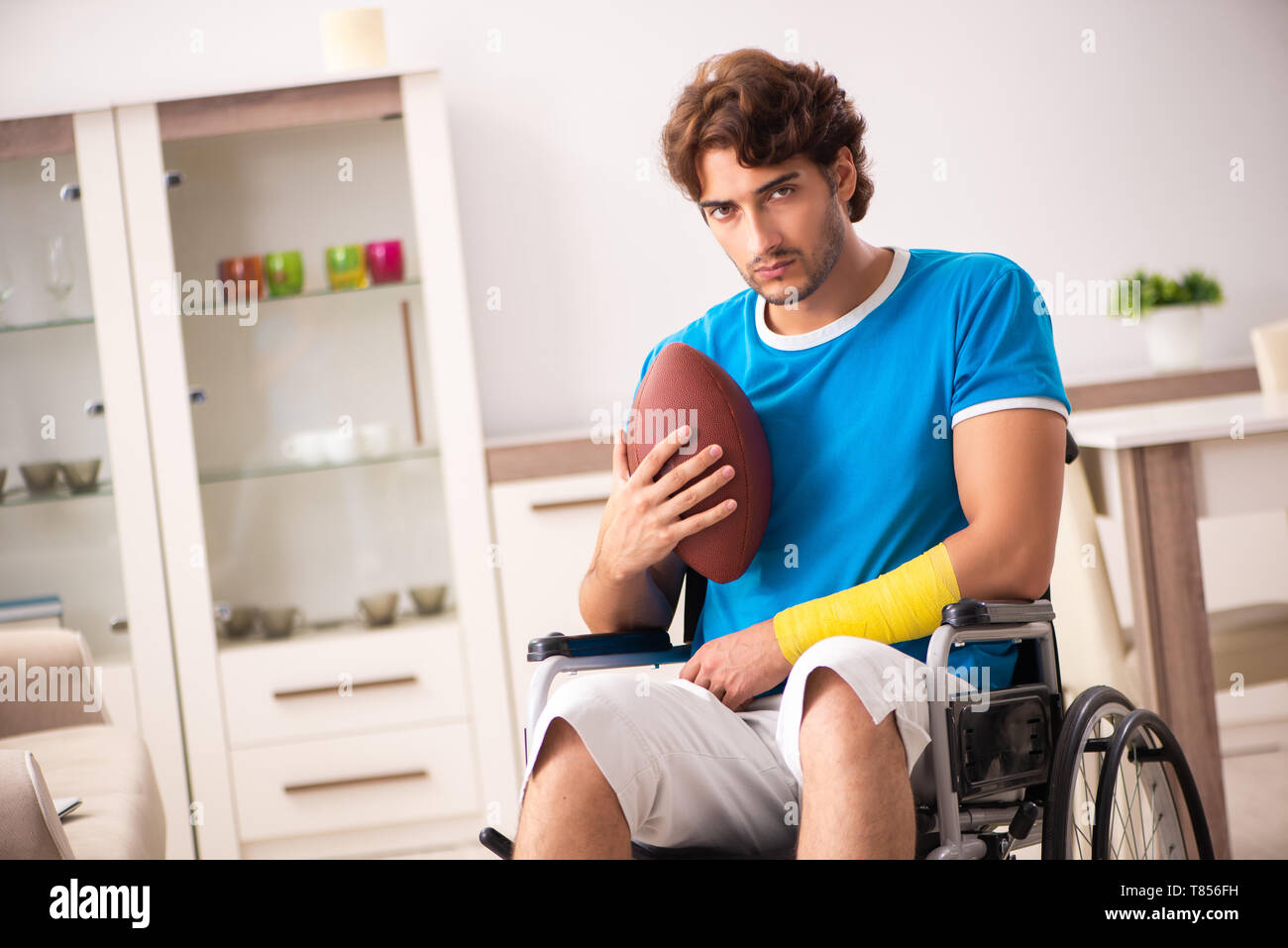 Injured man recovering from his injury Stock Photo - Alamy
