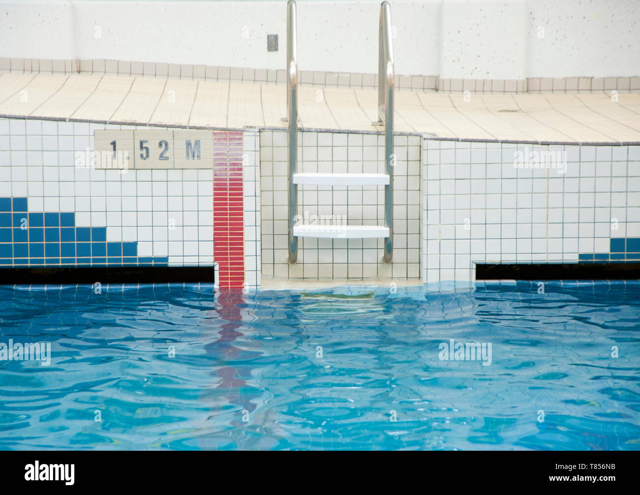Ladder Going Into a Public Swimming Pool Stock Photo - Alamy