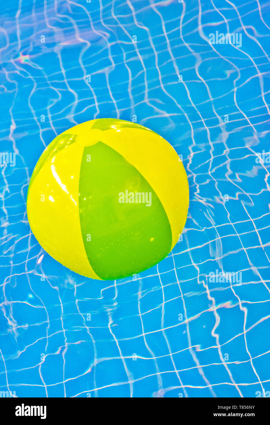 Beach Ball in a Swimming Pool Stock Photo - Alamy