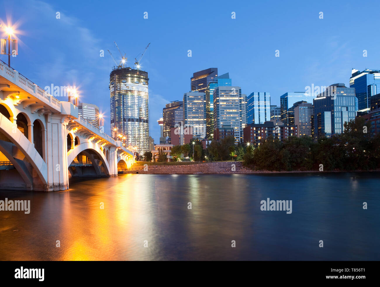 Centre Street Bridge and Calgary Skyline, dusk, a tall building under ...