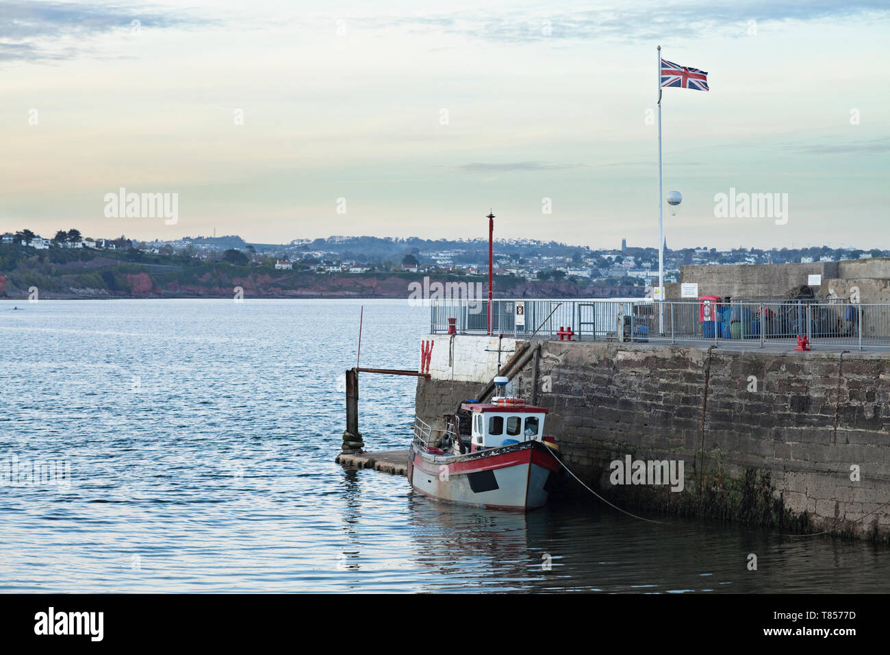 harbour with boats moored at the sea wall in an estuary Stock Photo - Alamy