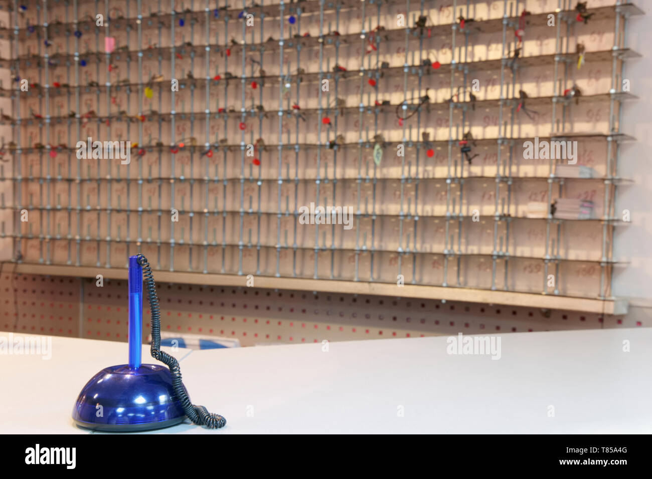 Pen at a Reception Desk Stock Photo - Alamy