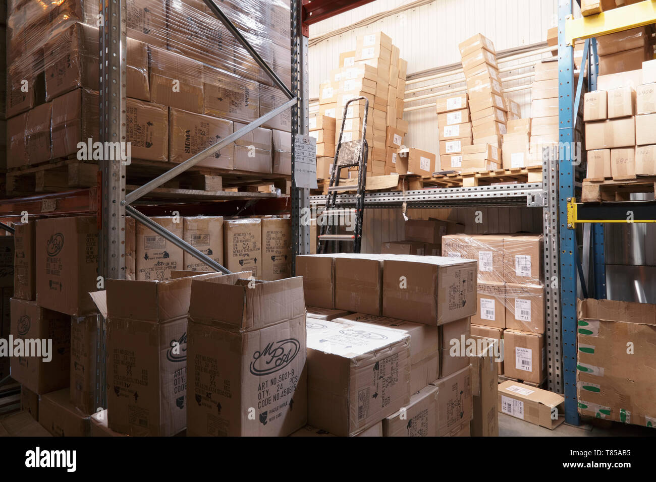 Boxes Stored in a Warehouse Stock Photo - Alamy