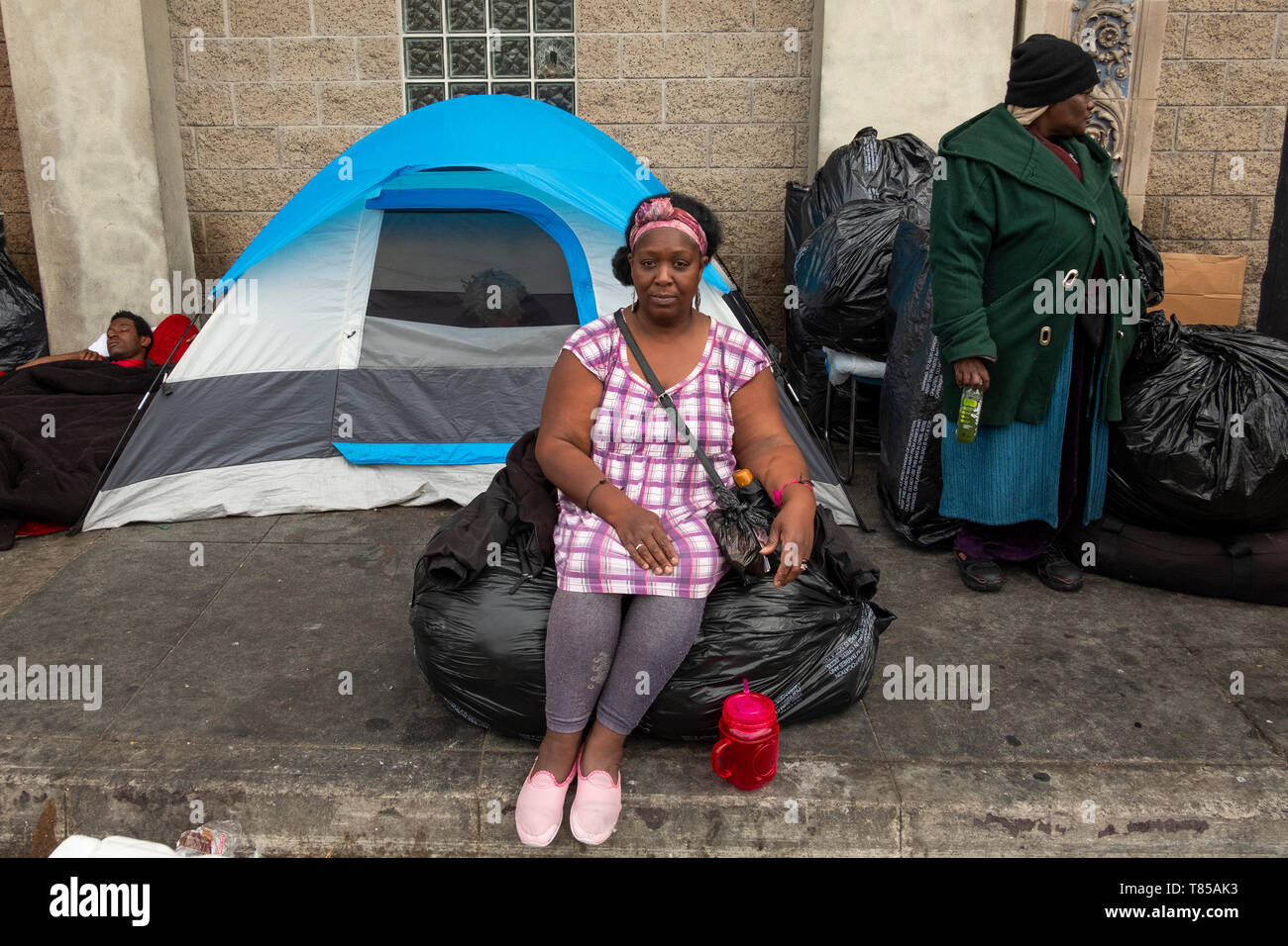 Homeless people outside The Midnight Mission. Los Angeles, California ...